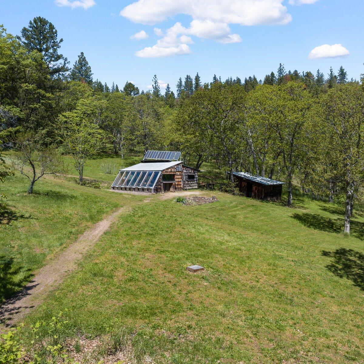 Sustainable Off-Grid Living: 4 Cabins and Bunkhouse on 100 Acres. Owner ...